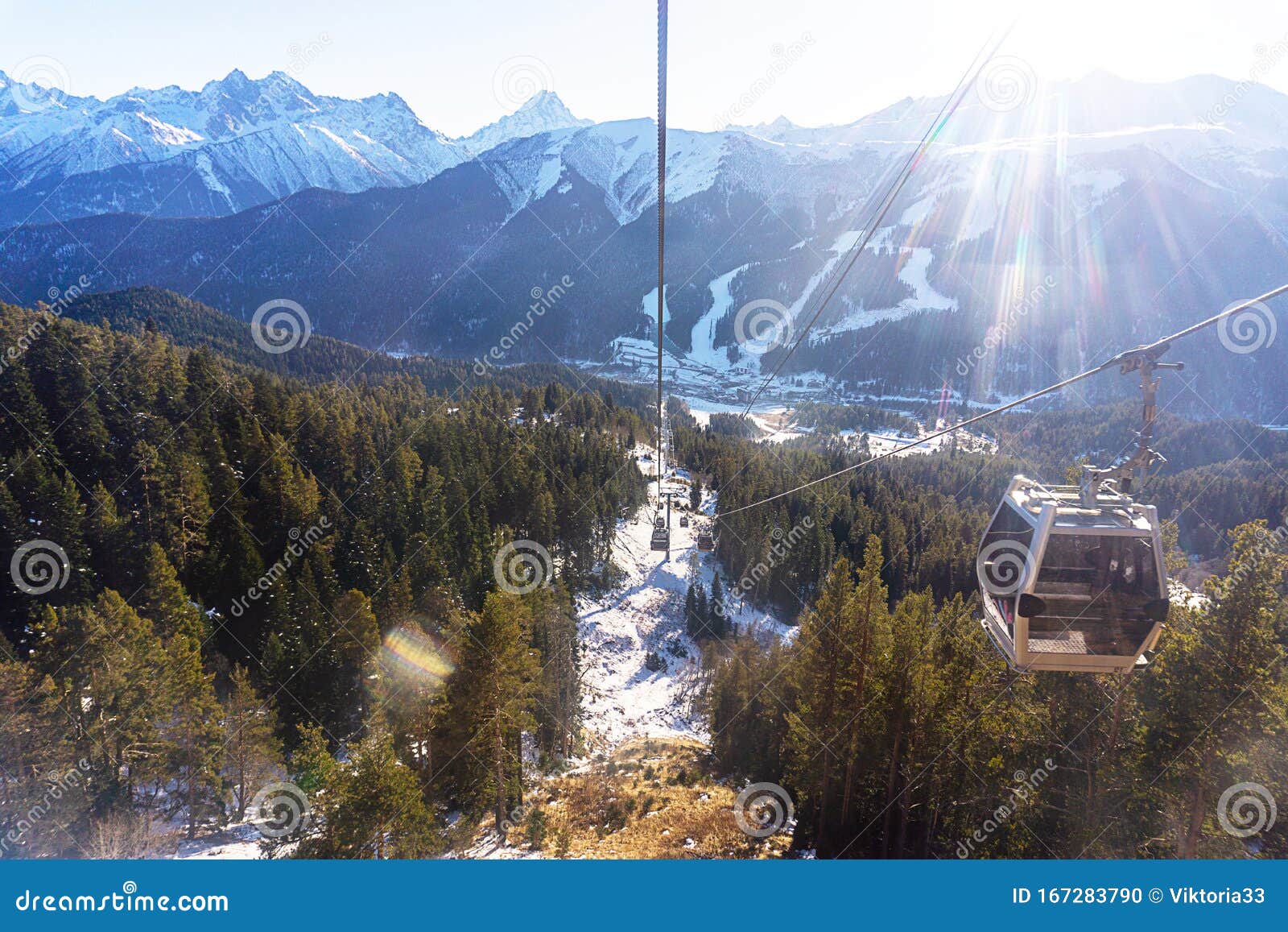 Winter Mountain Ski Base with Chairlift and Mountain Views Stock Photo ...