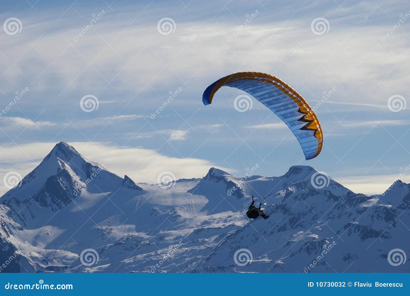 Winter Paragliding Over Mountain Peaks Stock Photo - Image of lift ...