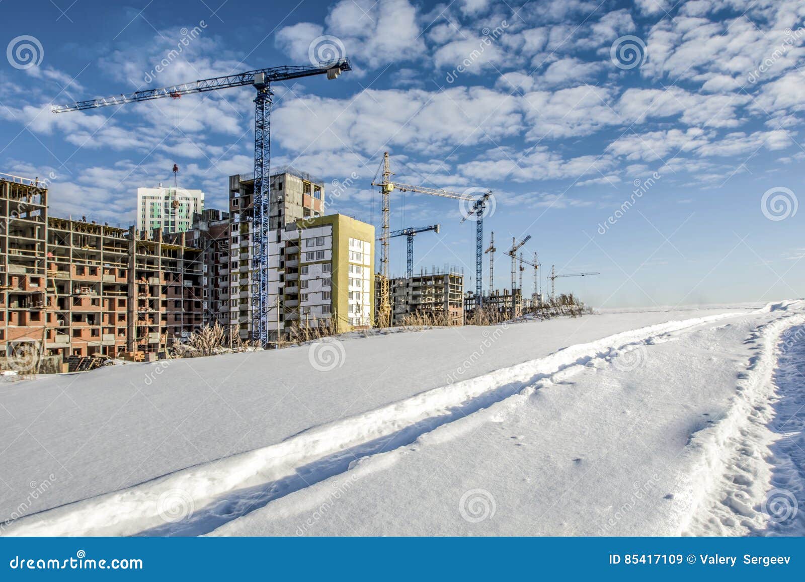 Winter Road on a Background of Construction of New Houses Stock Image ...