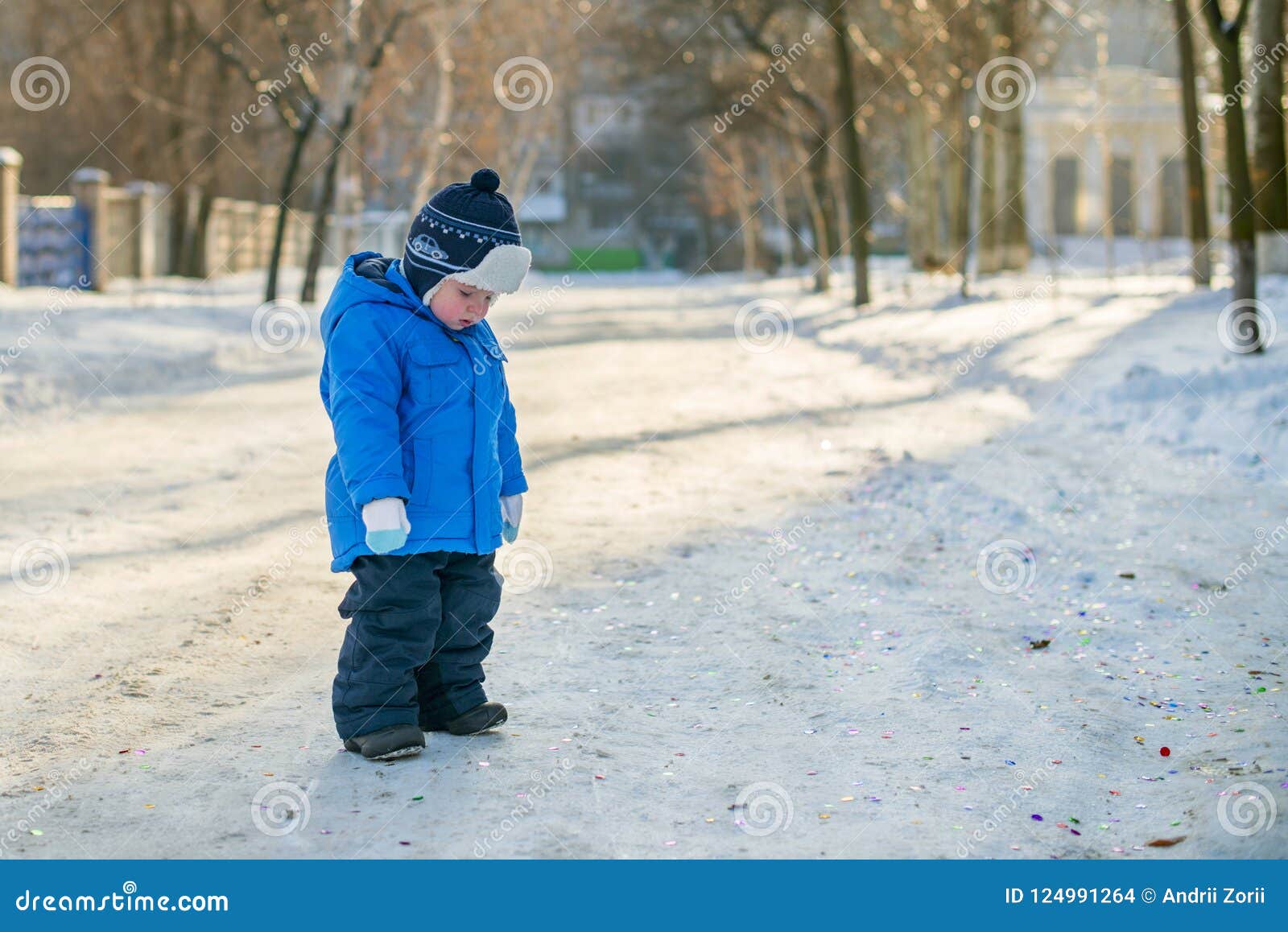 Winter Sad Boy Walking on a Snowy Street Stock Photo - Image of games ...