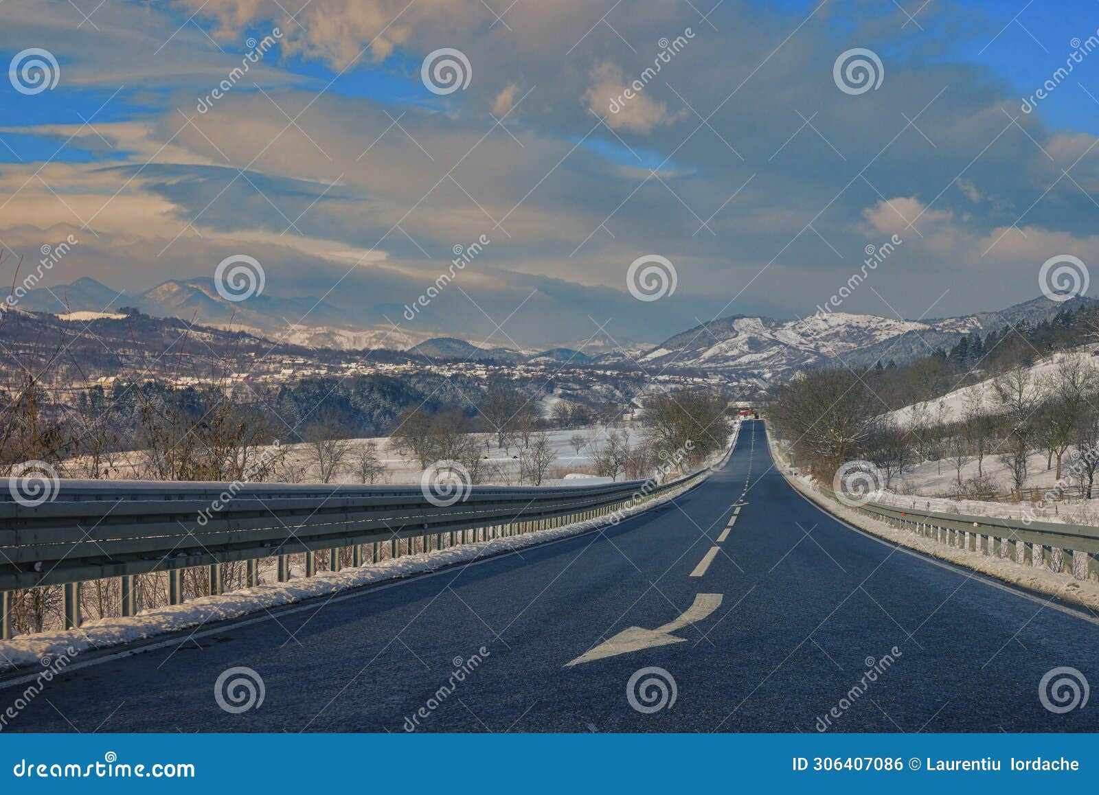 Winter Scene of a Road and Mountains in Rural Area Stock Photo - Image ...