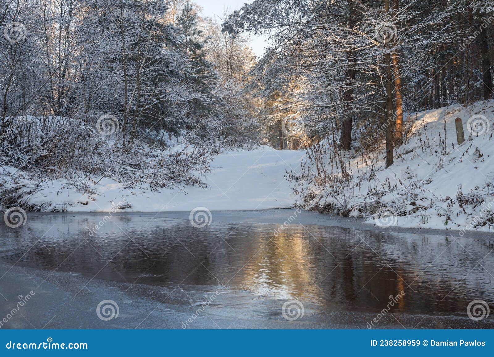 Winter Scenery with Freezing Forest River and Beautiful Sunlight ...