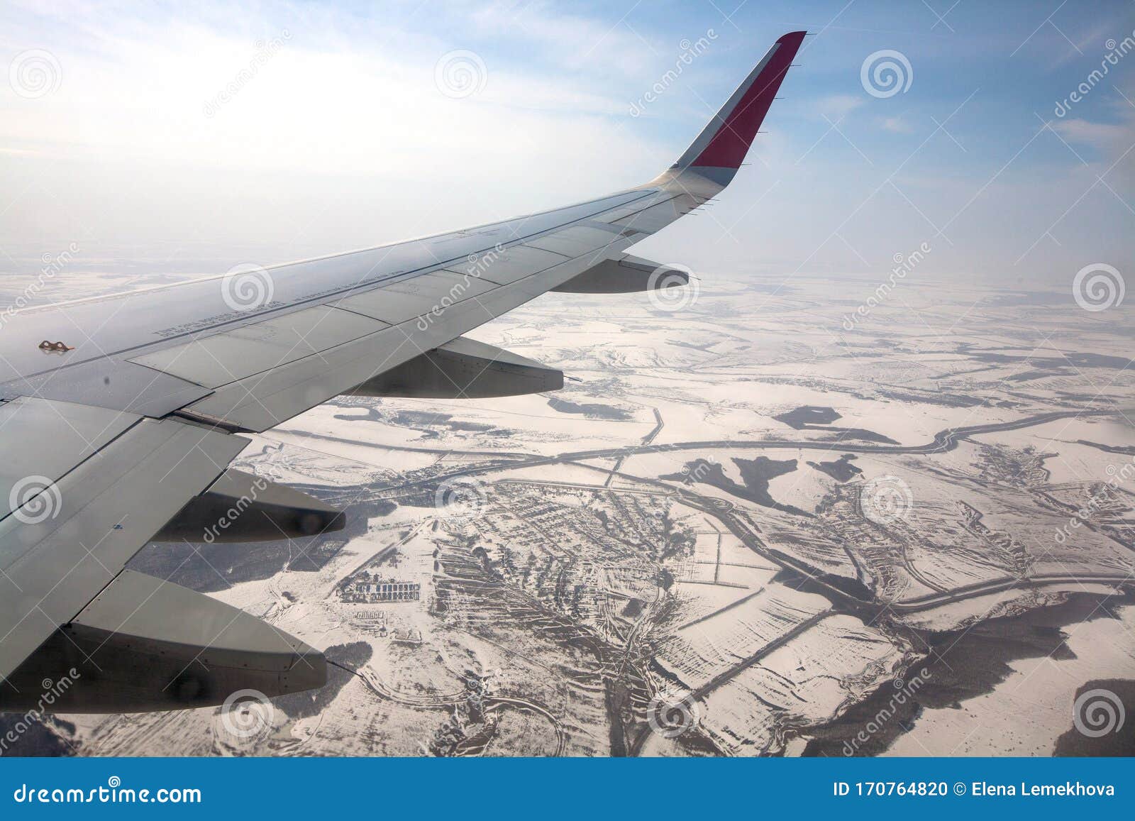 Winter. Snow and Ice Expanses Under the Wing of the Aircraft Stock ...