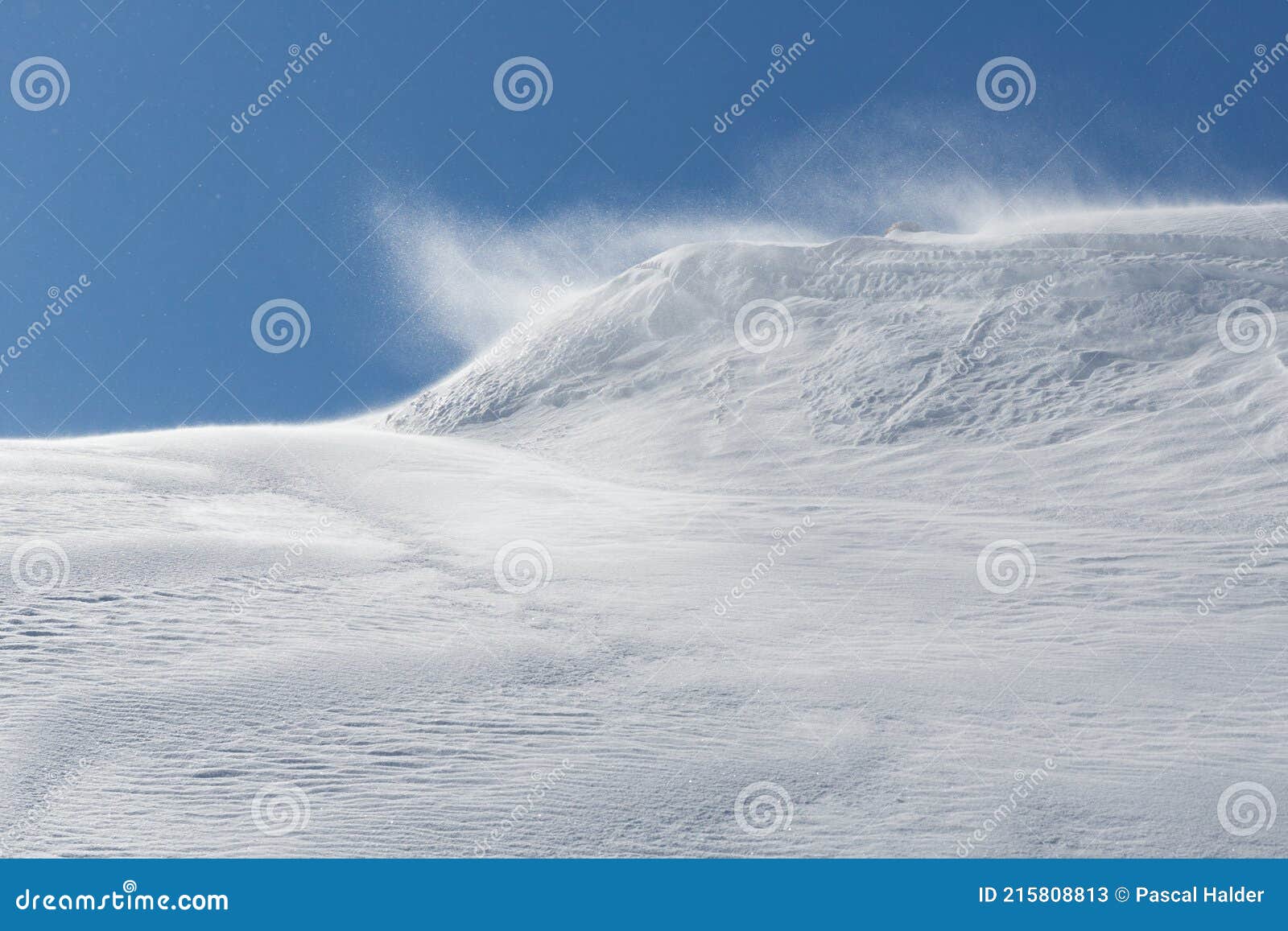 Winter Storm with Wind Blowing Over Snow Cornice in Snowy Landscape ...