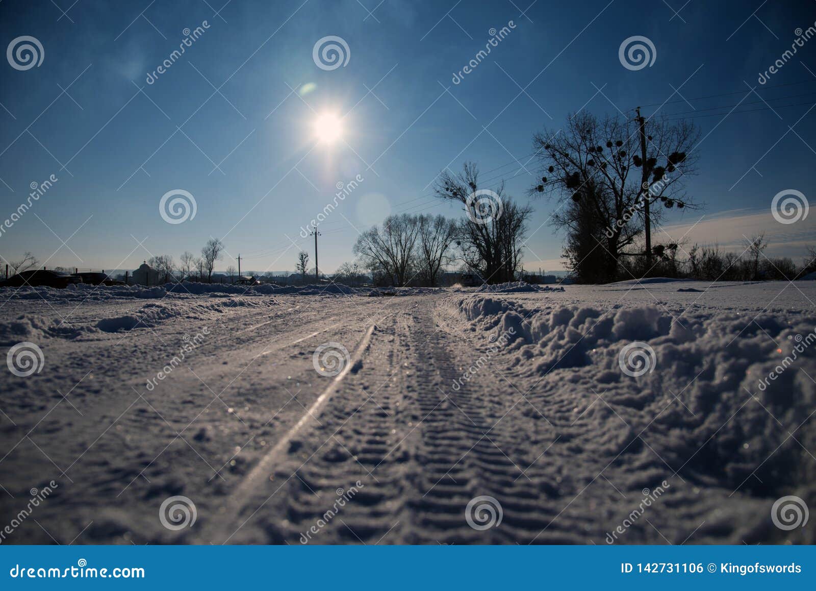 Winter Sun Illuminates the Snow-covered Car Rut Stock Photo - Image of ...