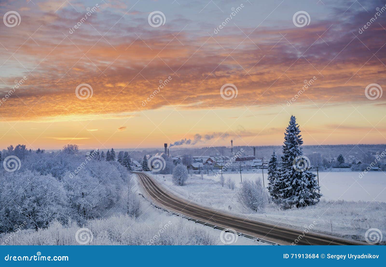 Winter Sunset Road through Snowy Fields Stock Photo - Image of ...