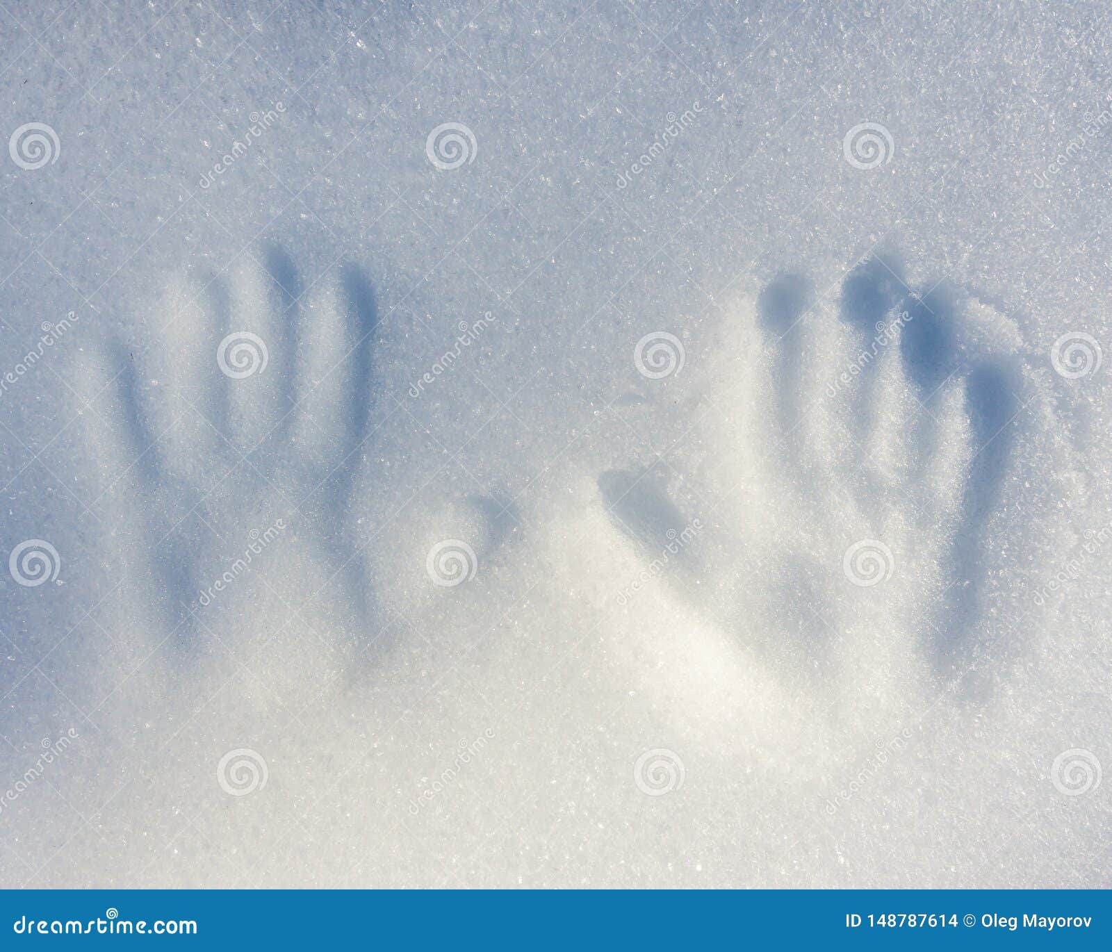 Winter Theme Two Handprints in the Snow Stock Photo - Image of hand ...