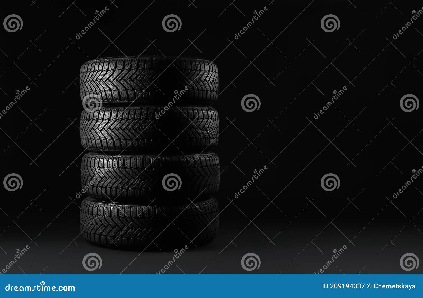 Winter Tires on Black Background. Space for Text Stock Image - Image of ...