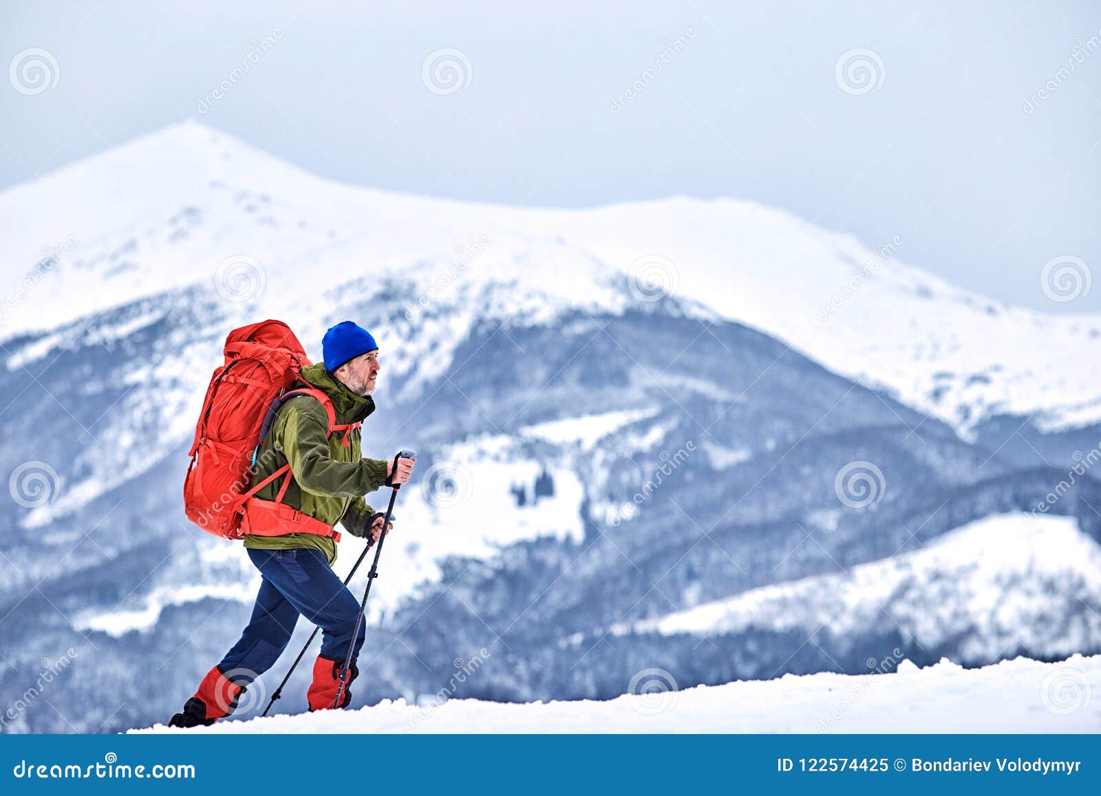 Winter Climb To the Top of the Mountain with a Backpack. Stock Image ...