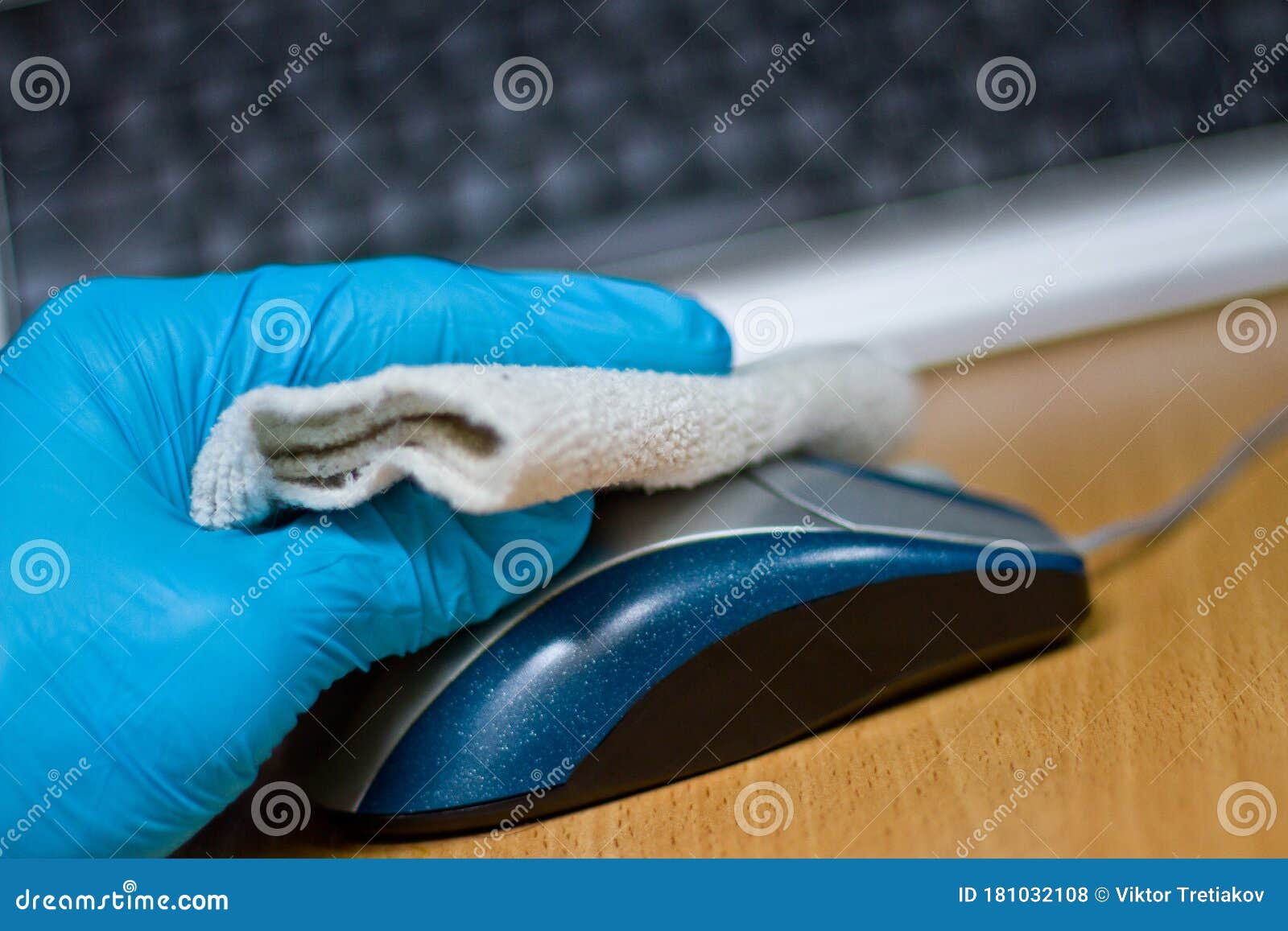 Wipe with Antibacterial Wipe on the Surface of a Computer Mouse ...