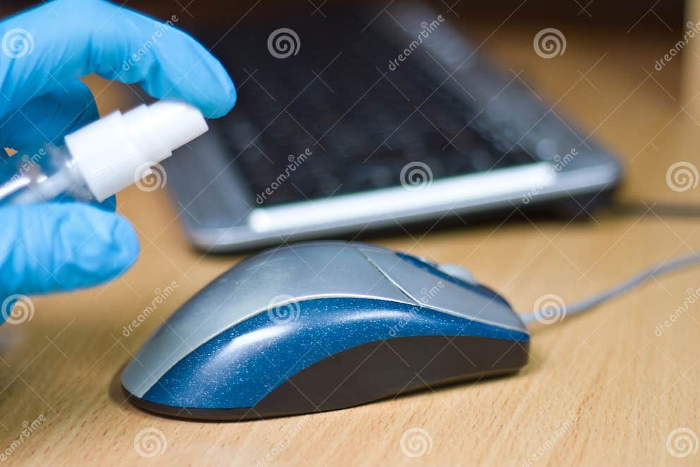 Wipe with Antibacterial Wipe on the Surface of a Computer Mouse ...