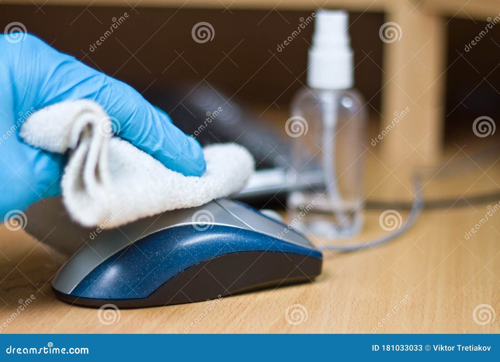 Wipe with Antibacterial Wipe on the Surface of a Computer Mouse ...