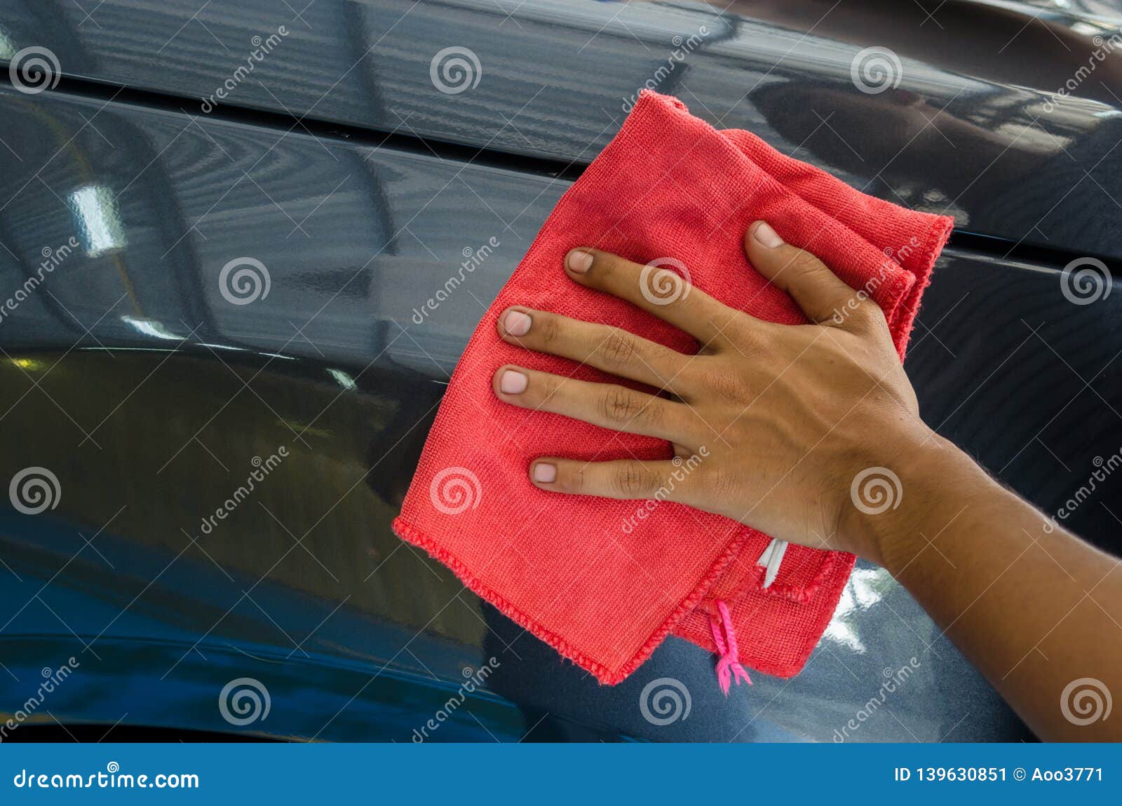 Wipe the car clean stock image. Image of driver, activity - 139630851