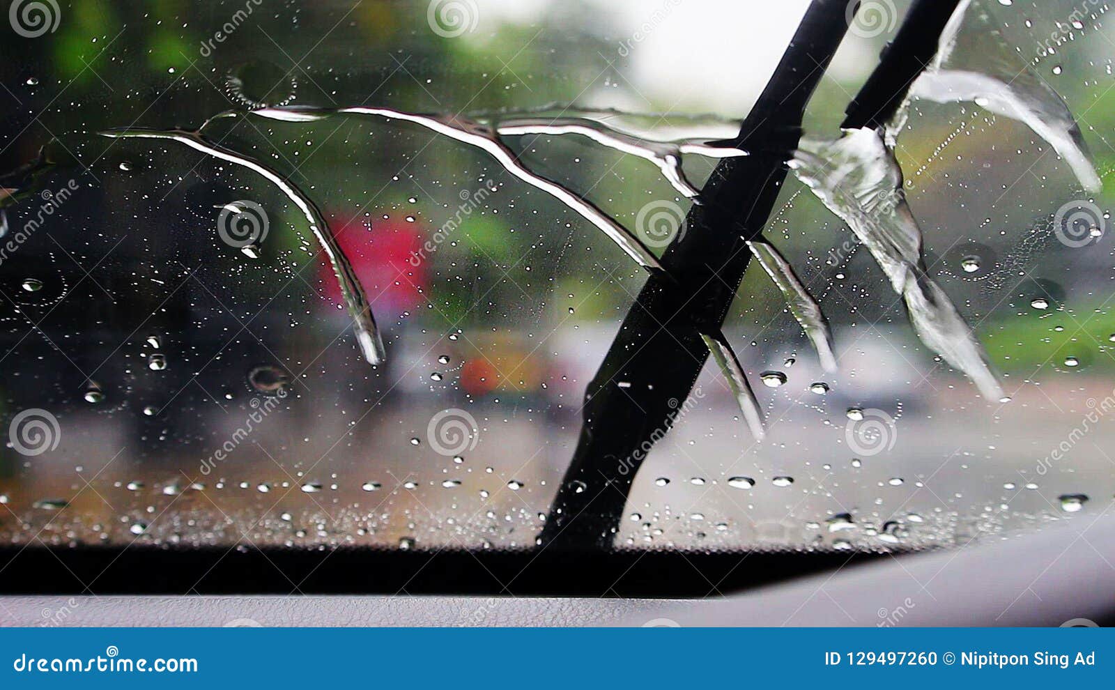 Wipe the Rain on the Windshield Stock Photo - Image of rainy, blur ...