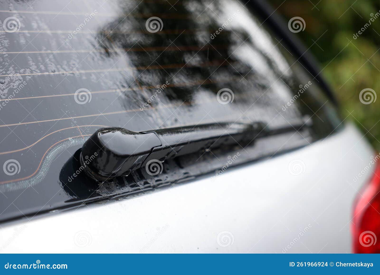 Wiper Cleaning Raindrops from Car Rear Windshield Outdoors Stock Photo ...