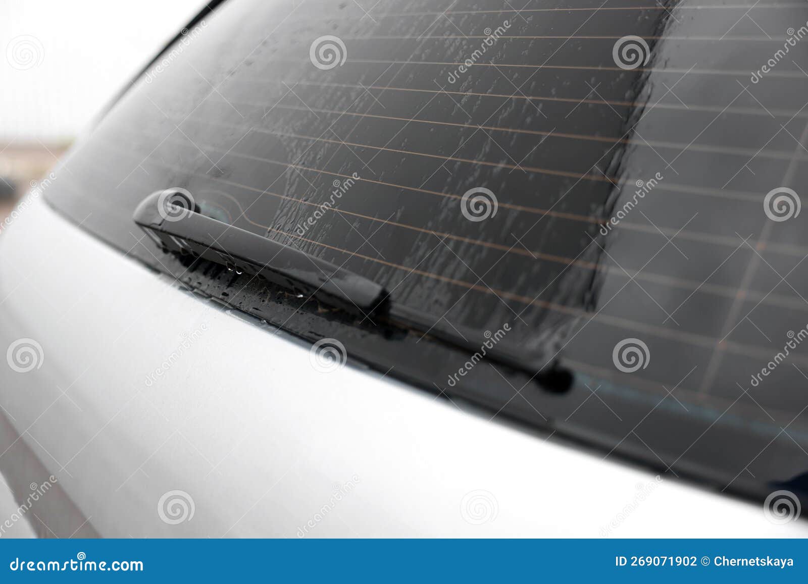 Wiper Cleaning Raindrops from Car Rear Windshield Outdoors Stock Photo ...