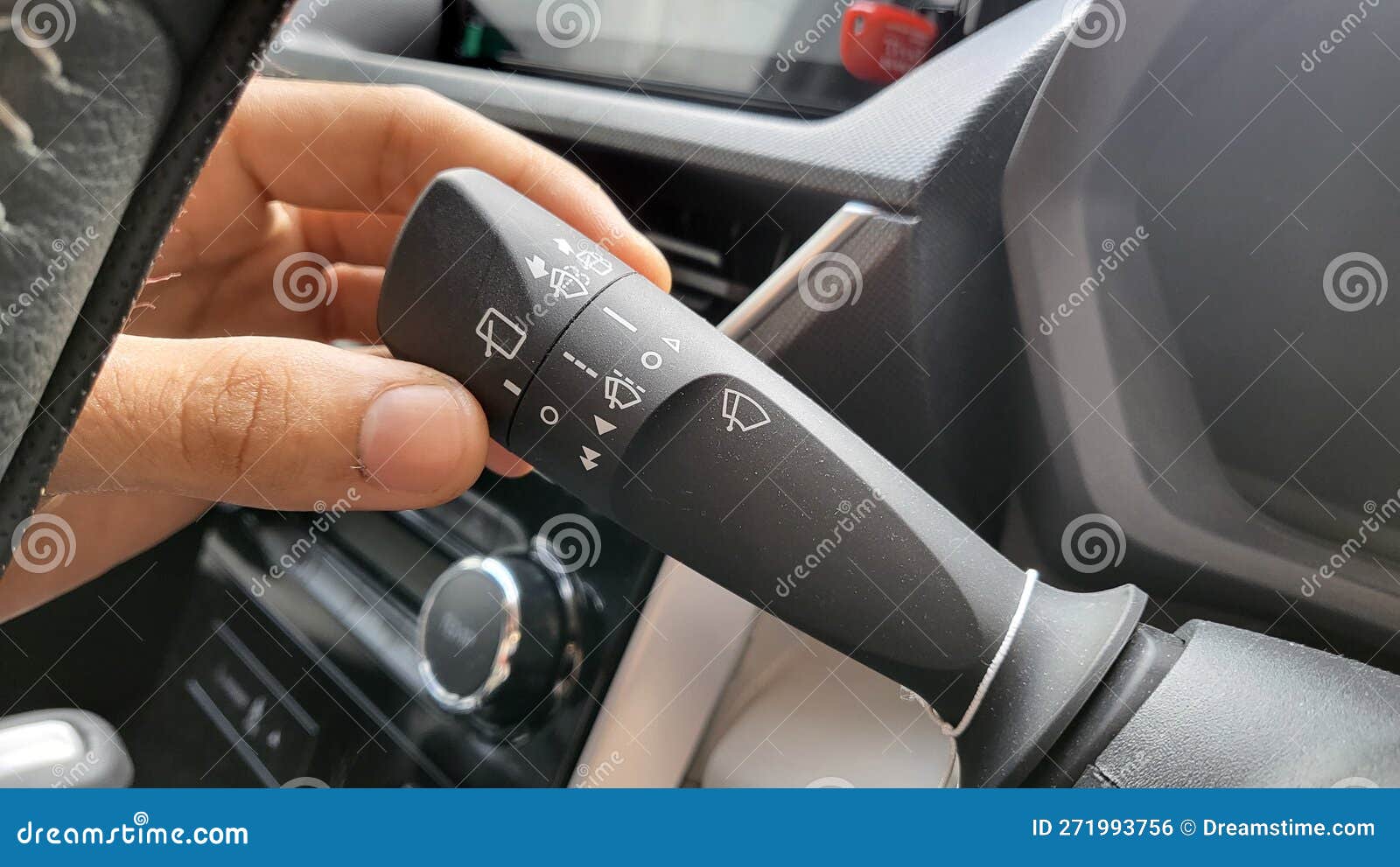 Wiper Control Button, an Asian Man S Hand is Operating the Wiper Switch ...