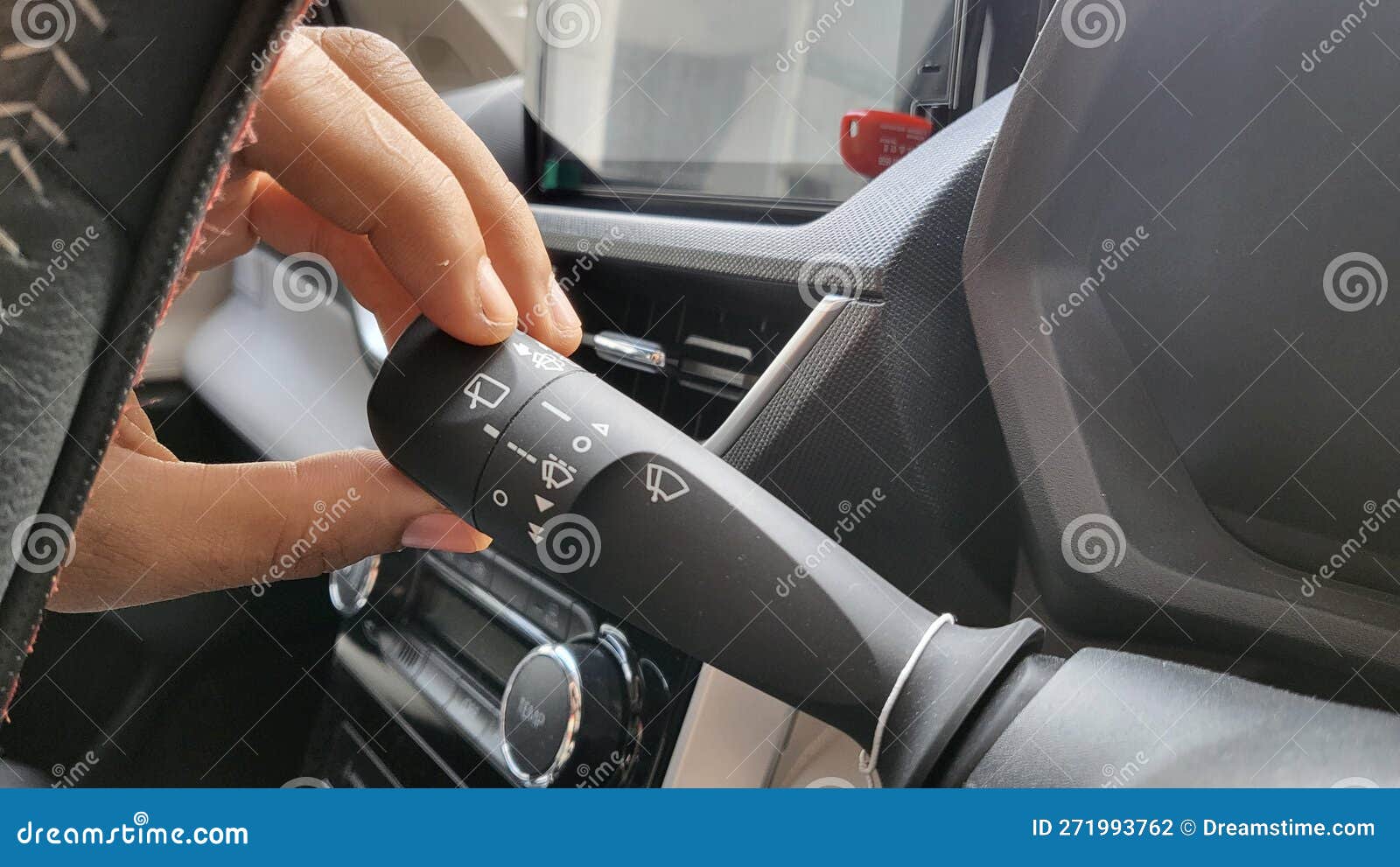 Wiper Control Button, an Asian Man S Hand is Operating the Wiper Switch ...