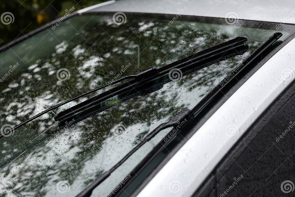 Wipers Cleaning Raindrops from Car Windshield Outdoors Stock Image ...