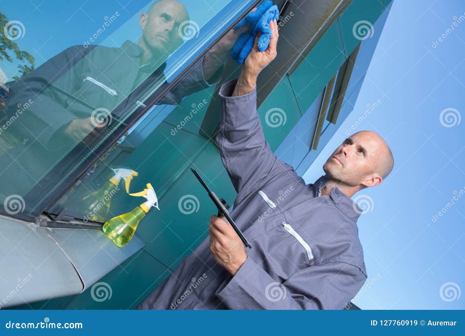 Wiping the glass window stock image. Image of private - 127760919