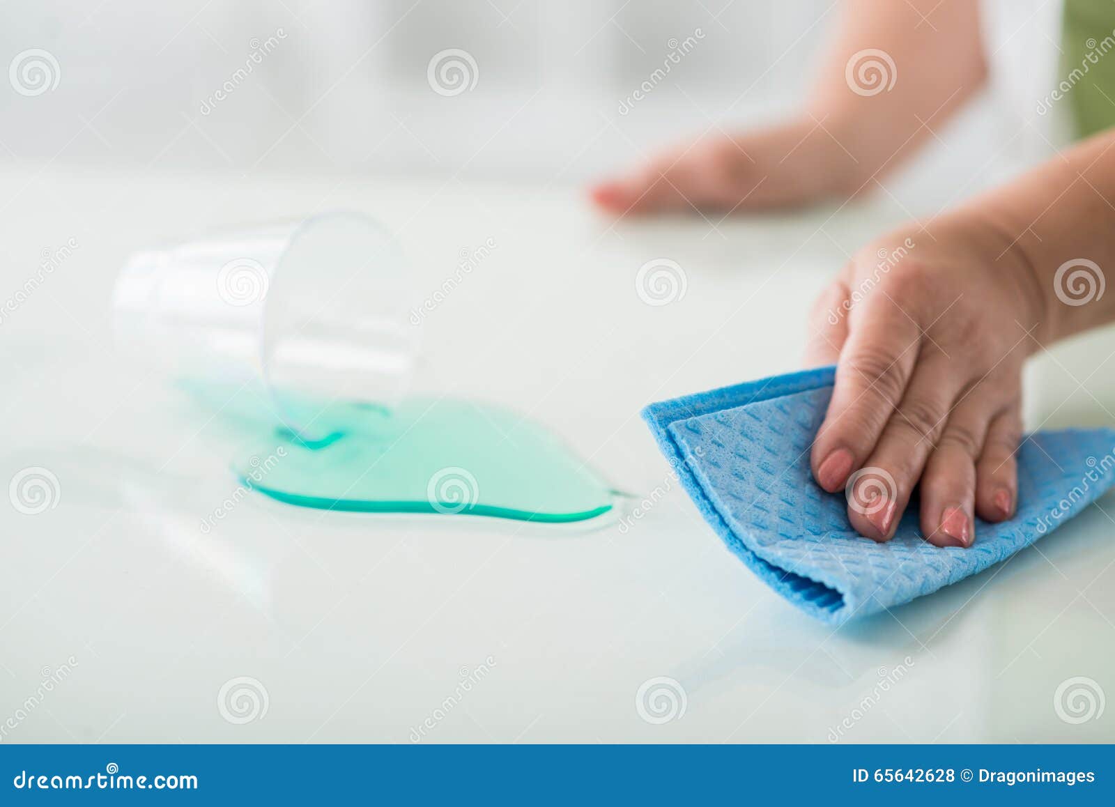 Wiping liquid stock photo. Image of cleaning, maid, wiping - 65642628