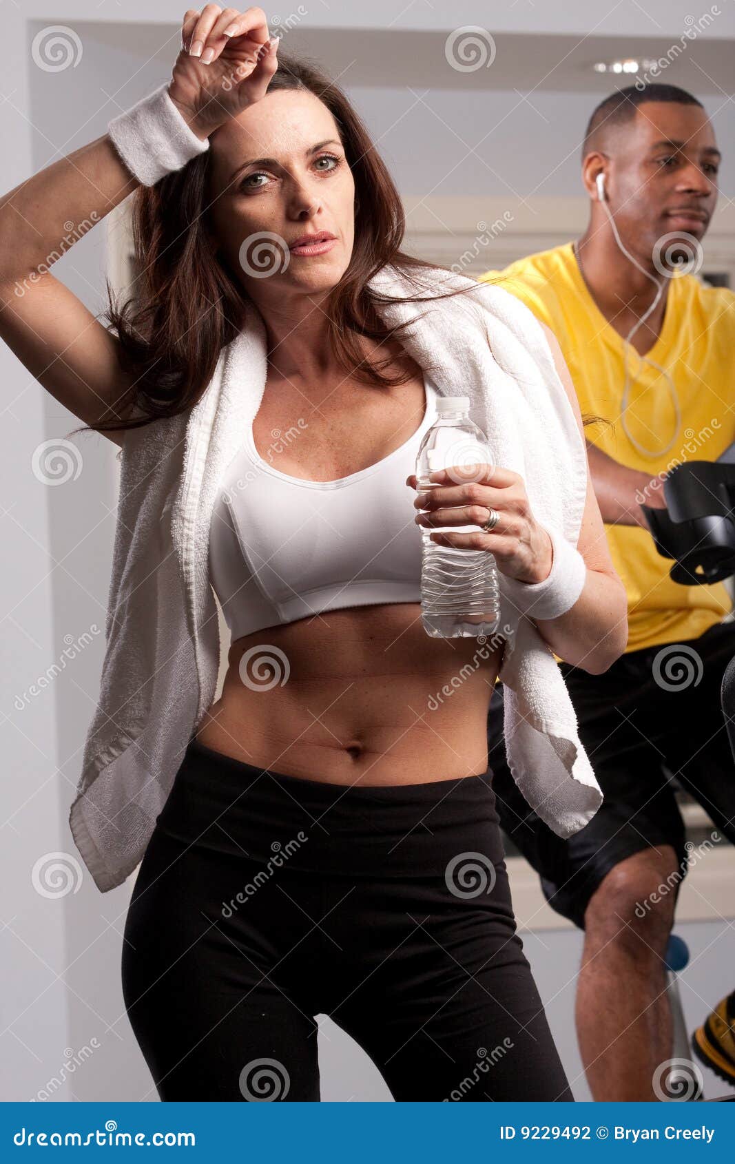 Wiping sweat from brow stock photo. Image of activity - 9229492