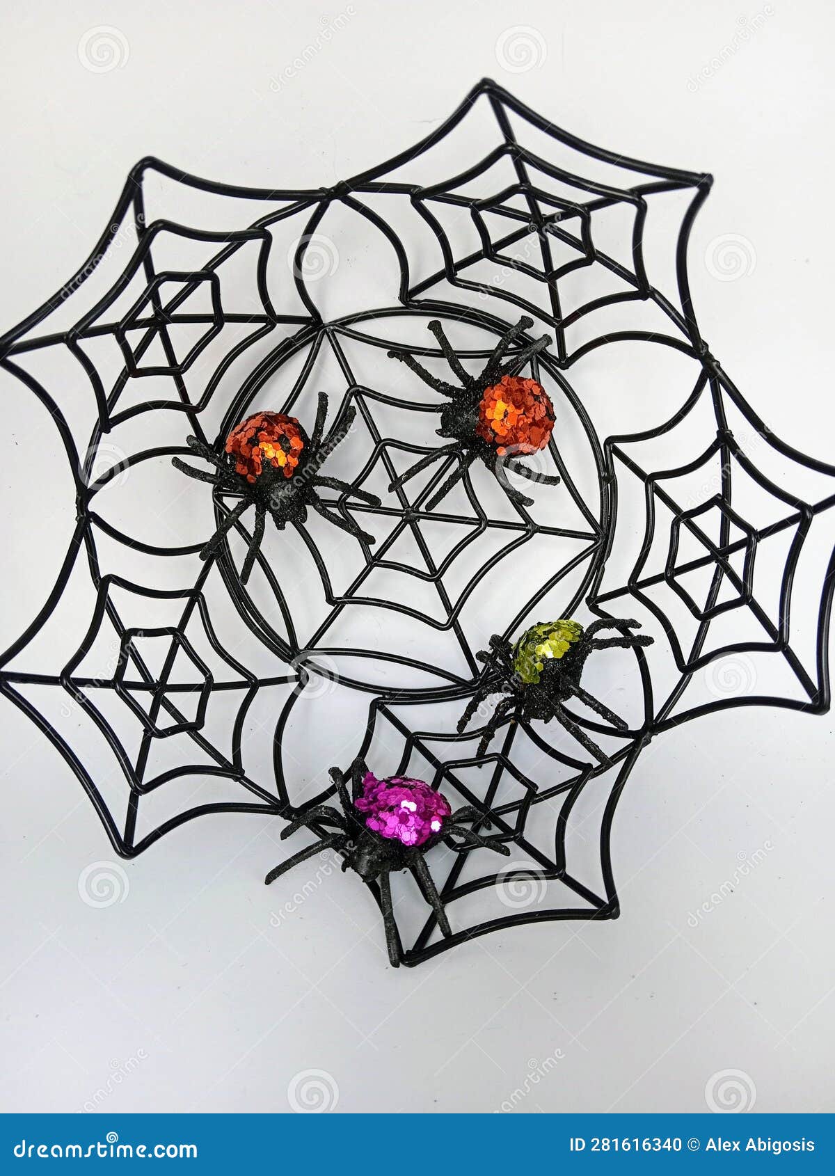 Wire Abstract Spider Web with Glittery Spiders on it on a White ...