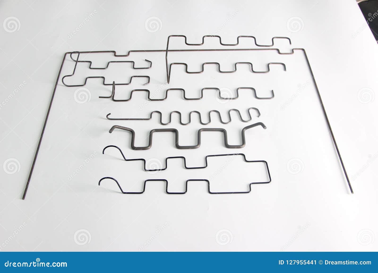 Wire bending forming parts stock image. Image of large - 127955441