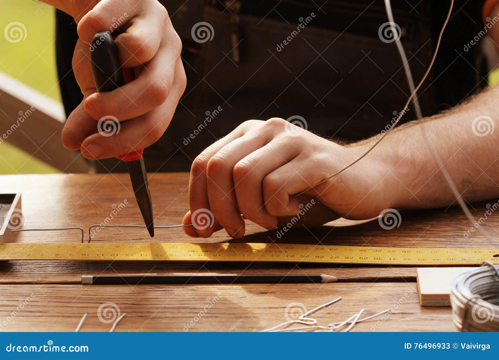 Wire bending with pliers stock image. Image of hand, tool - 76496933