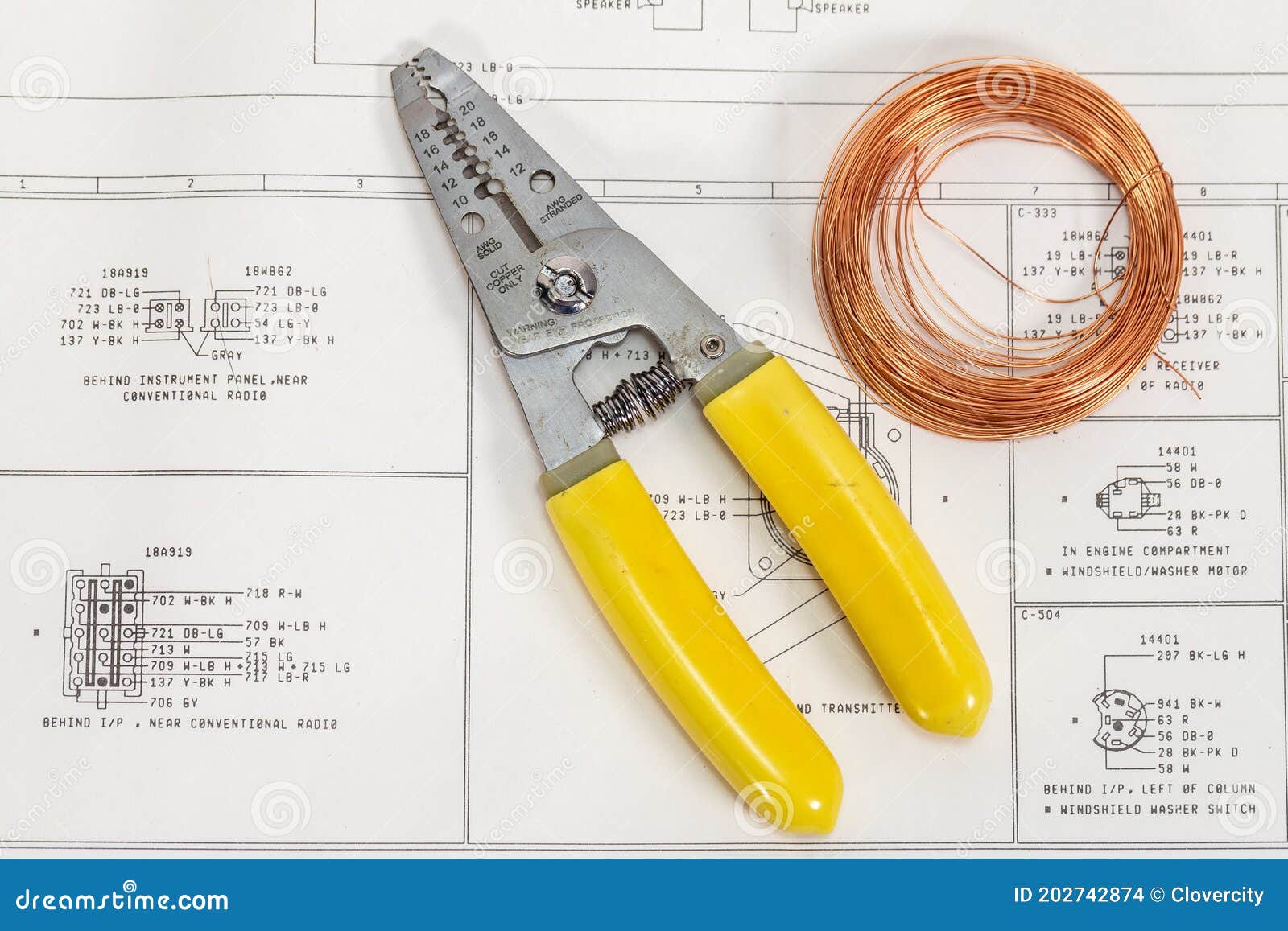 Wire Cutting Pliers on Electronic Schematic with Roll of Wire Stock ...