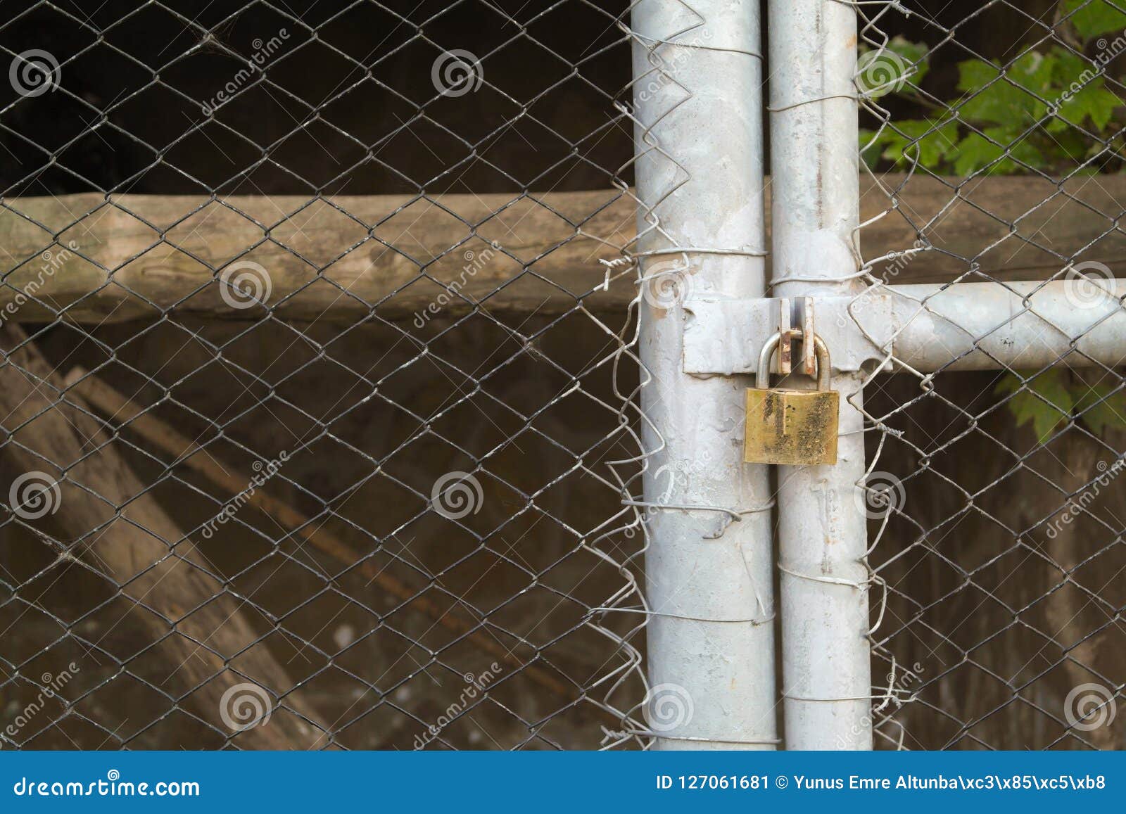 Wire Netting and Padlock stock image. Image of abstract - 127061681