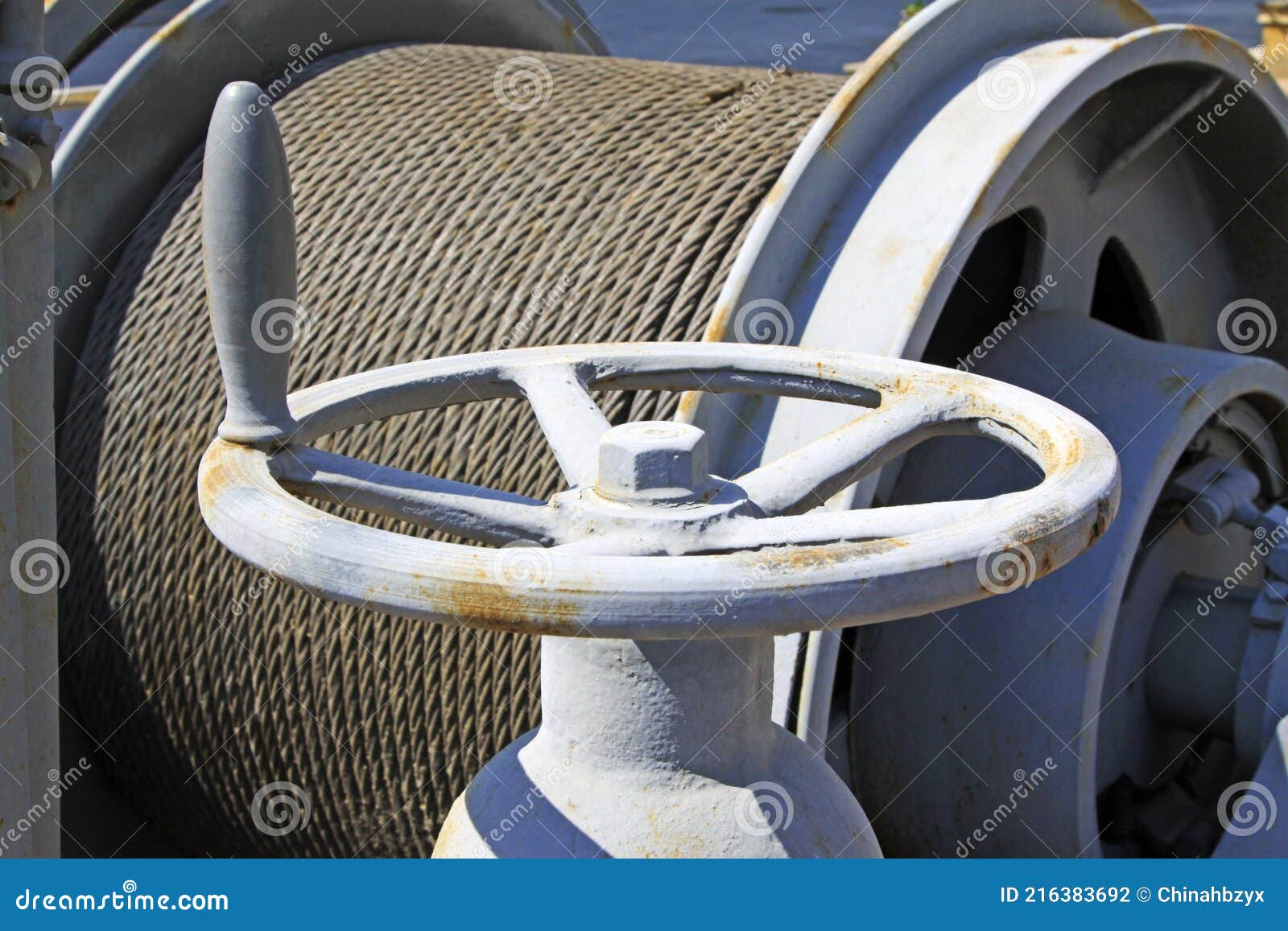 Wire rope and wheel handle stock photo. Image of rope - 216383692