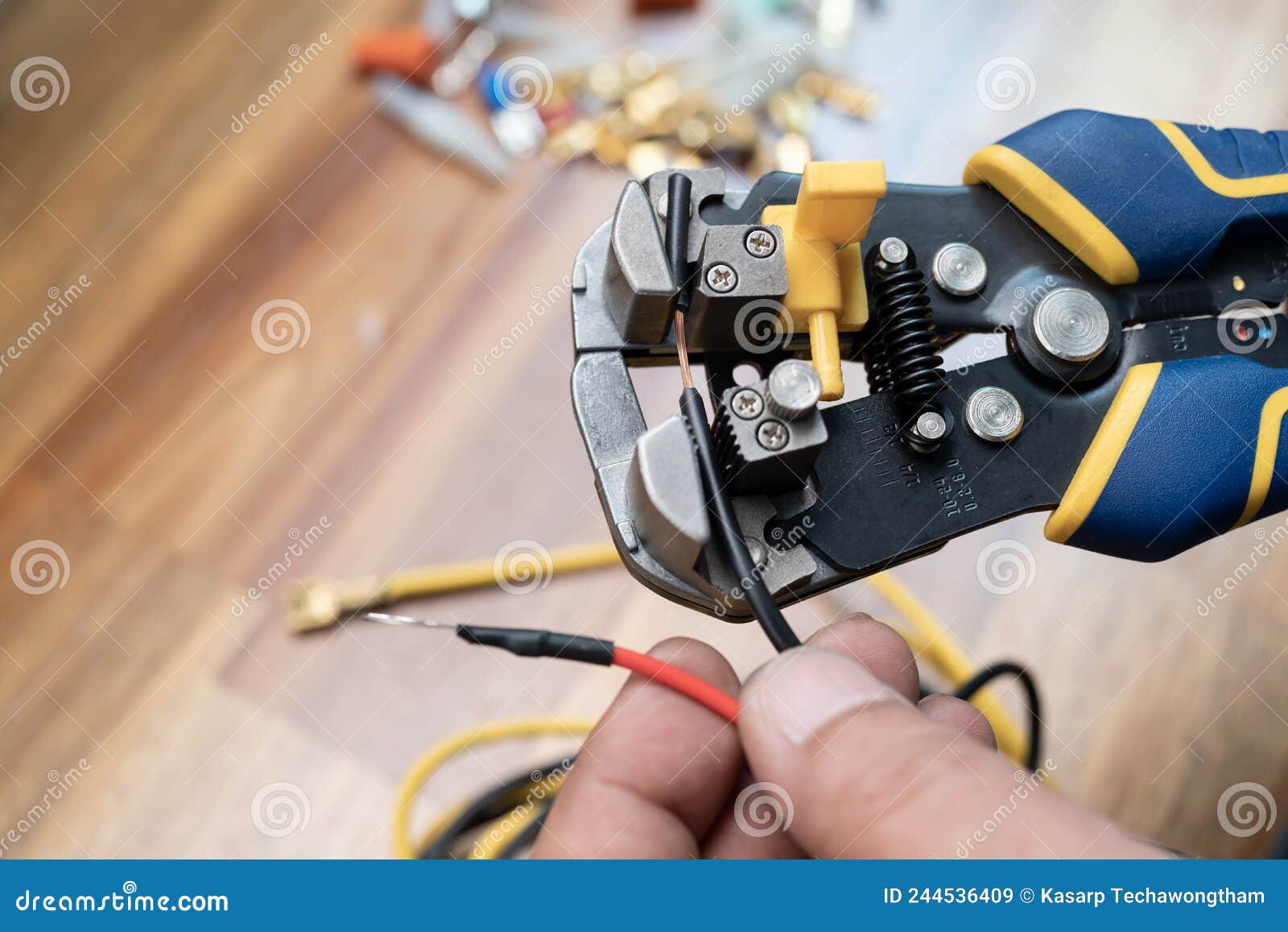 Wire Strippers or Cable Strippers Tool . Electrician Holding Cable ...