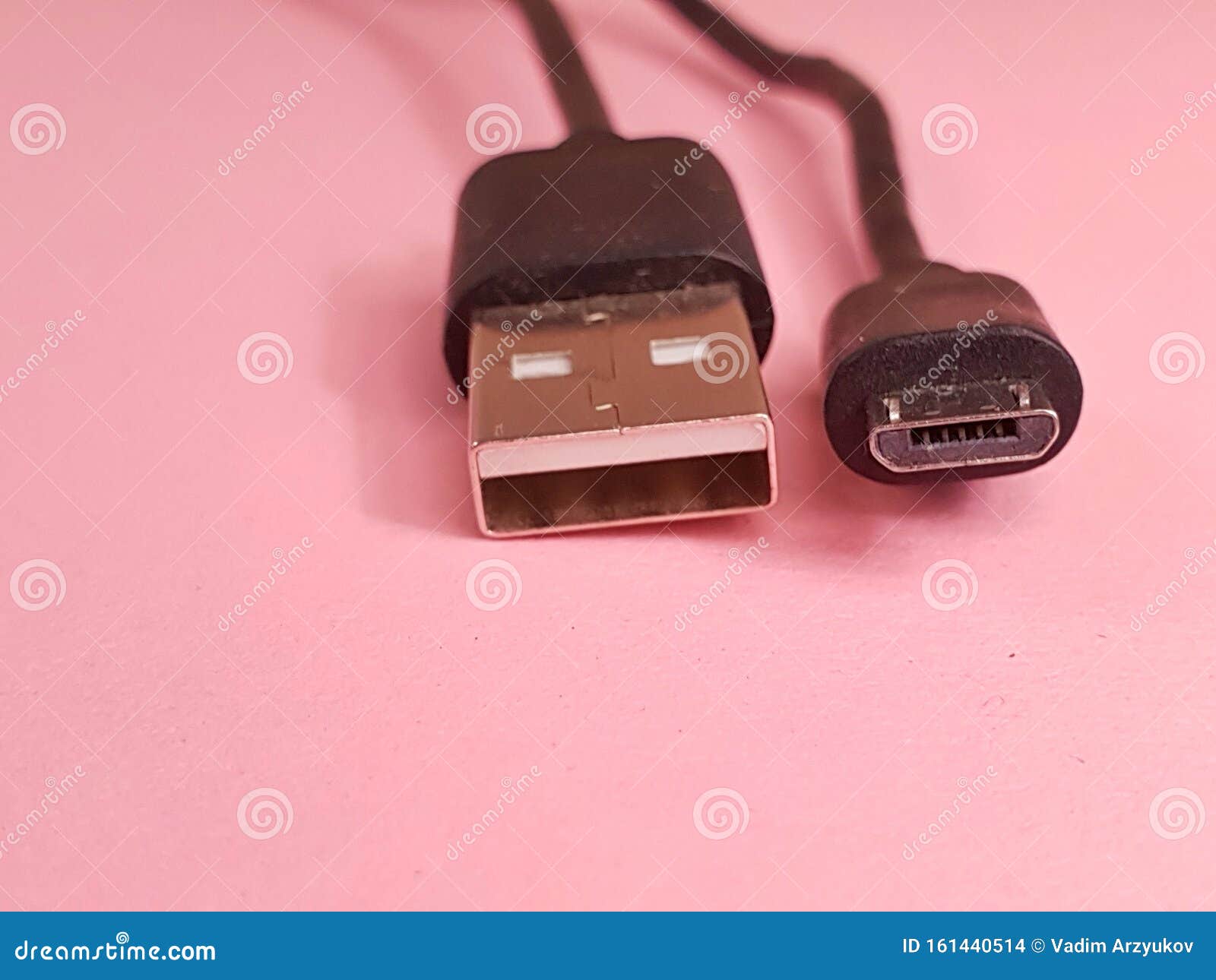 Wire with USB Connector and Micro Usb Closeup on Pink Background Stock ...
