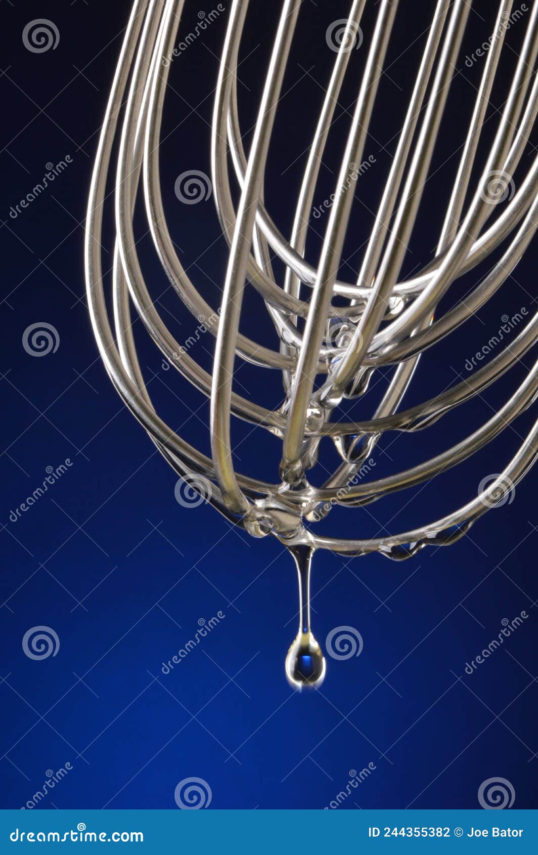 Wire Whisk Dripping with Oil Stock Photo - Image of drops, stir: 244355382