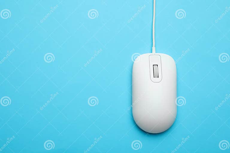 Wired Computer Mouse on Light Blue Background. Space for Text Stock ...