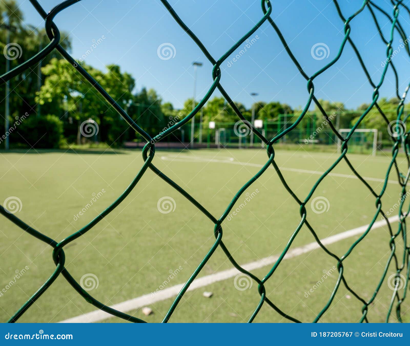 Fence With Soccer Field In Background Stock Photography | CartoonDealer ...