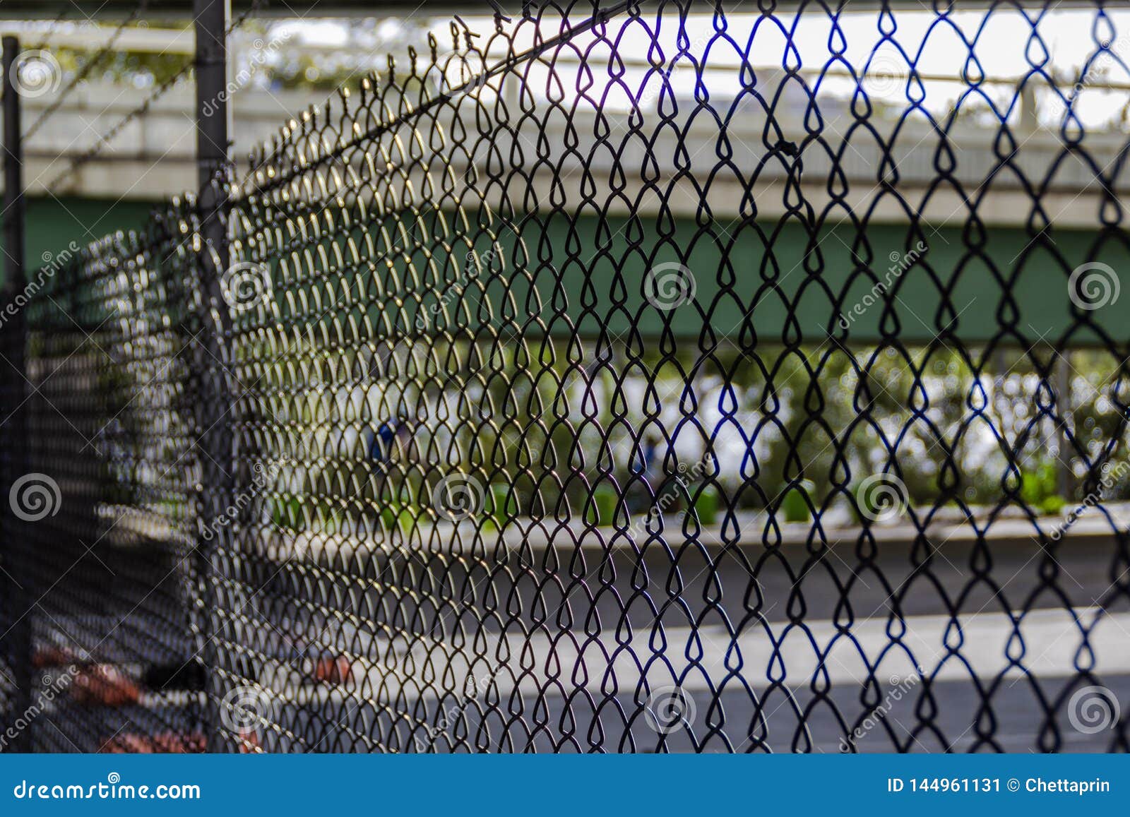 Wired Mesh Fence with Background of Overpass Bridge Stock Image - Image ...