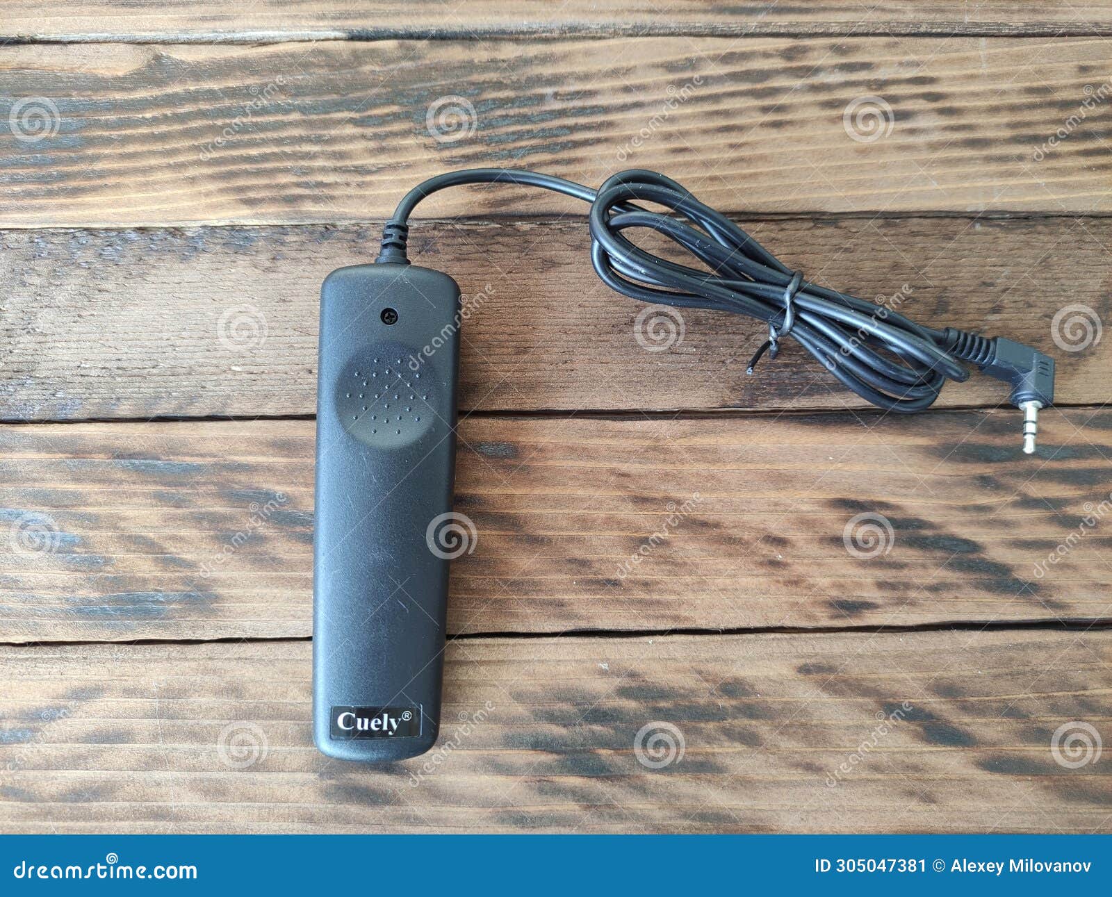 Wired Remote Control To Control the Camera on the Wooden Background ...