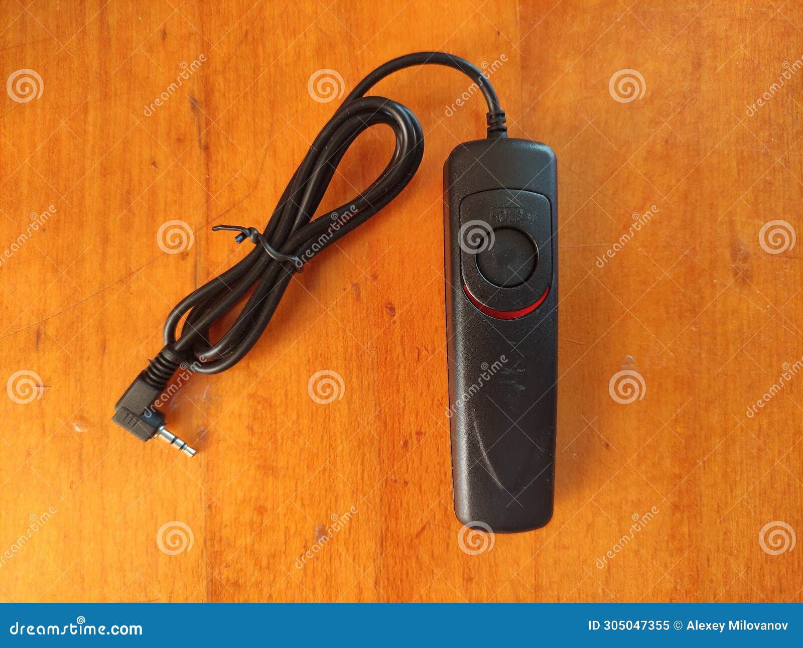 Wired Remote Control To Control the Camera on the Wooden Table Stock ...