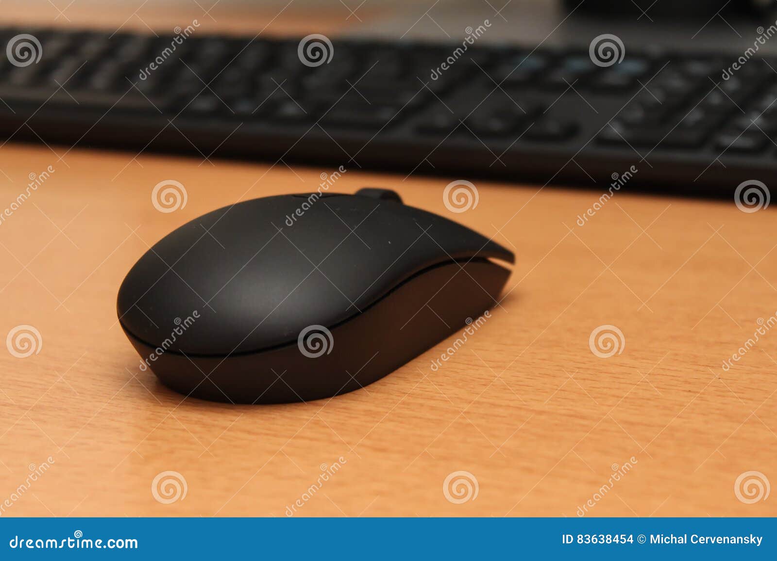 Wireless Black Stylish Computer Mouse Lying on Table. Stock Photo ...