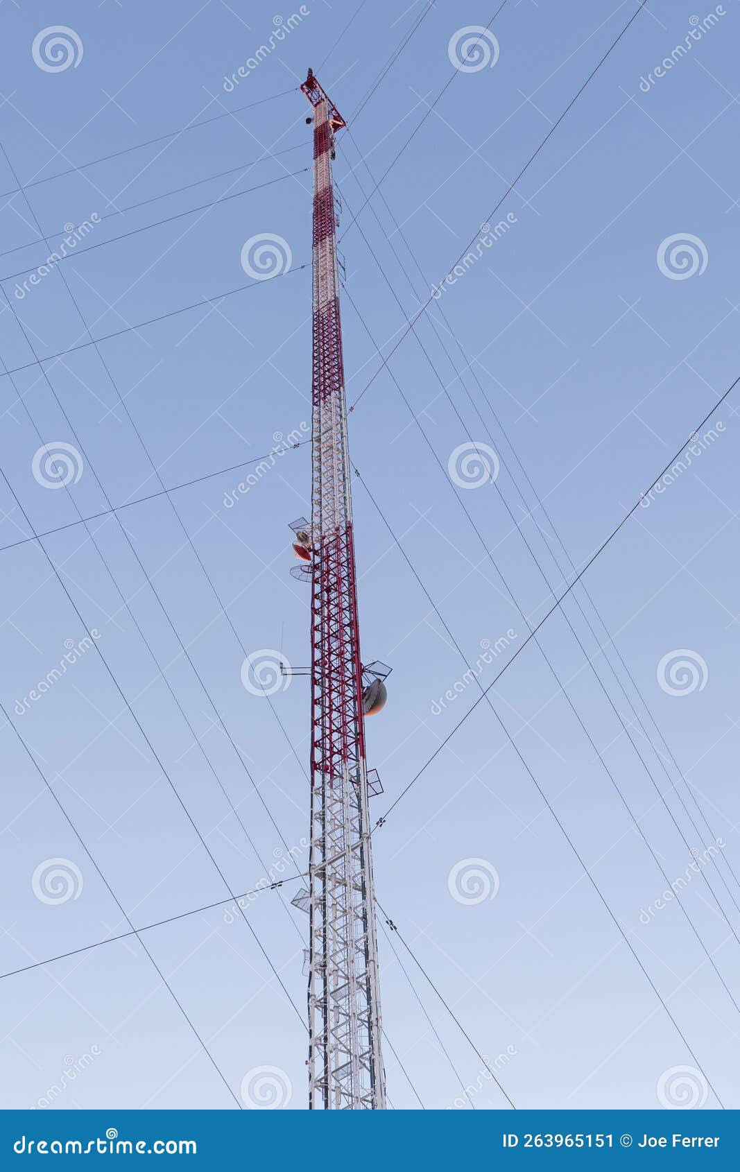 Wireless Communications Tower Against Blue Sky Stock Image - Image of ...