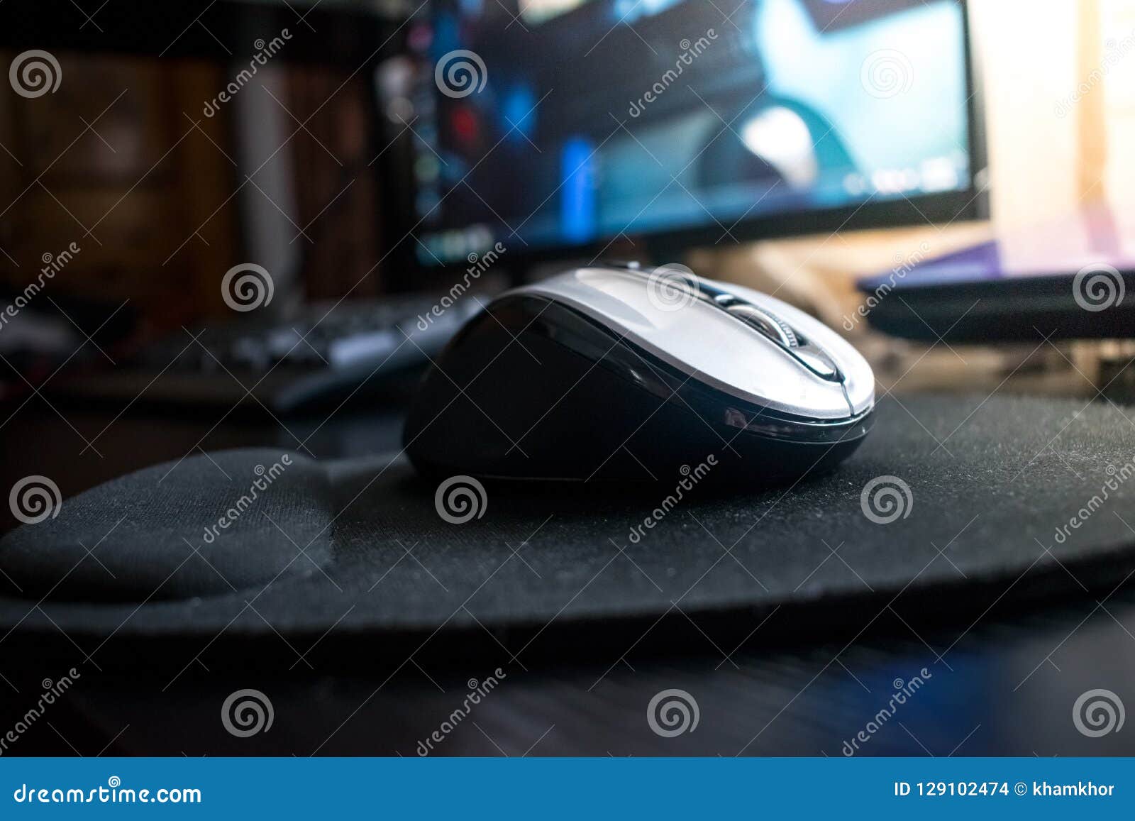 Closeup of Wireless Bluetooth Computer Mouse on a Black Desk with Mouse ...