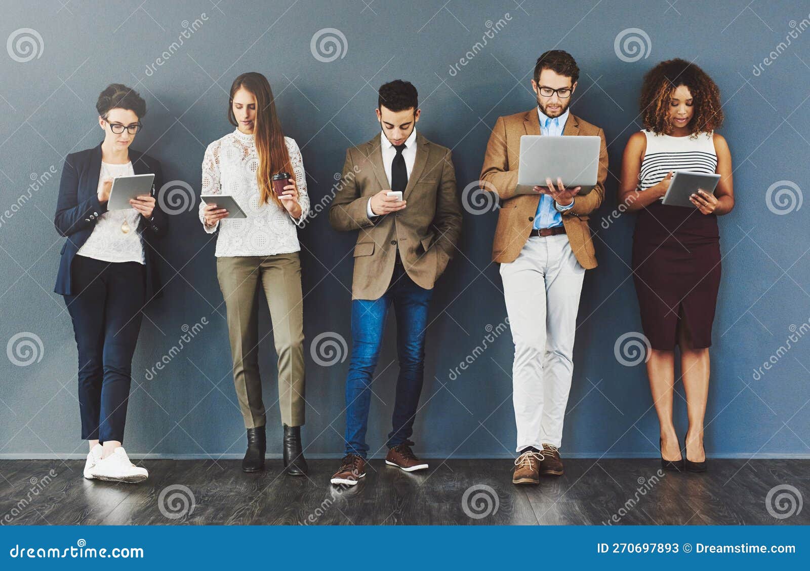 Wireless Entertainment for the Wait. Studio Shot of a Group of ...