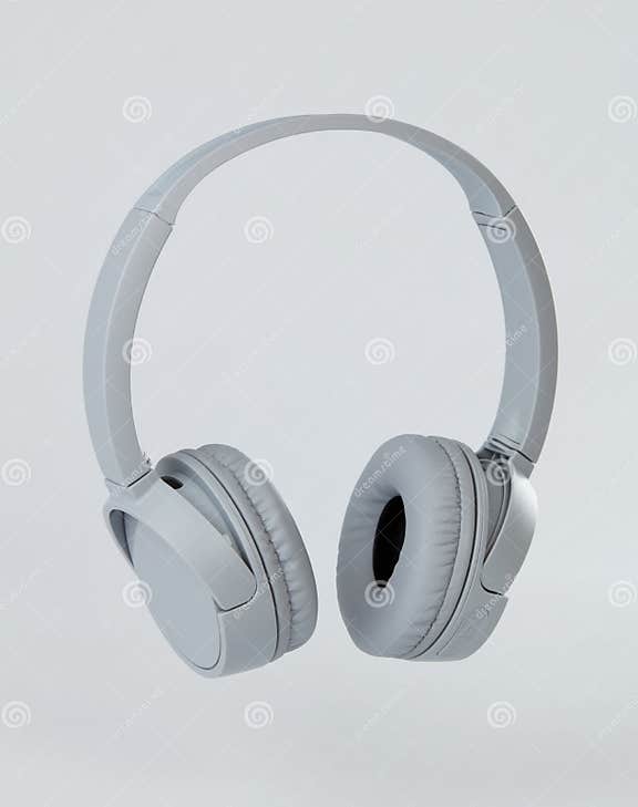 Wireless gray headphones stock photo. Image of gray - 201094980