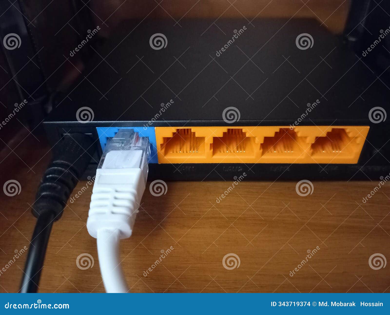 Wireless Internet Router Connected with Internet and Power Cable Stock ...