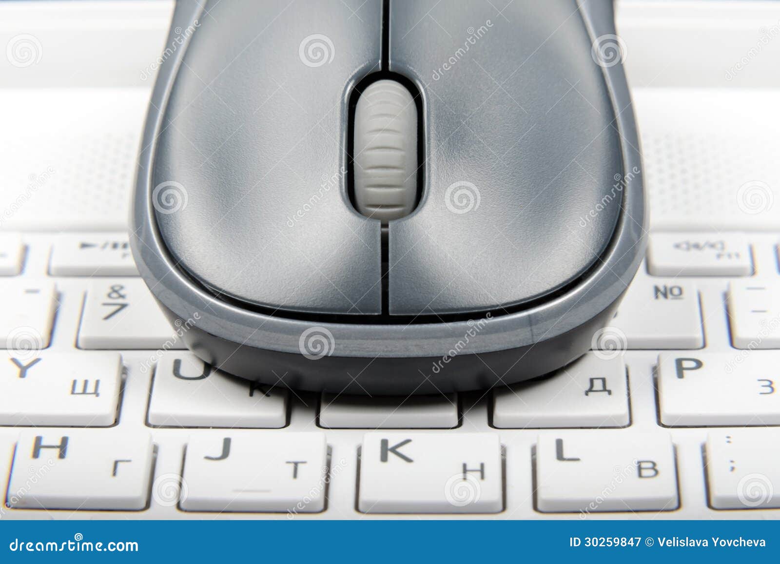 A Wireless Mouse Placed on Laptop Keyboard Stock Image - Image of black ...