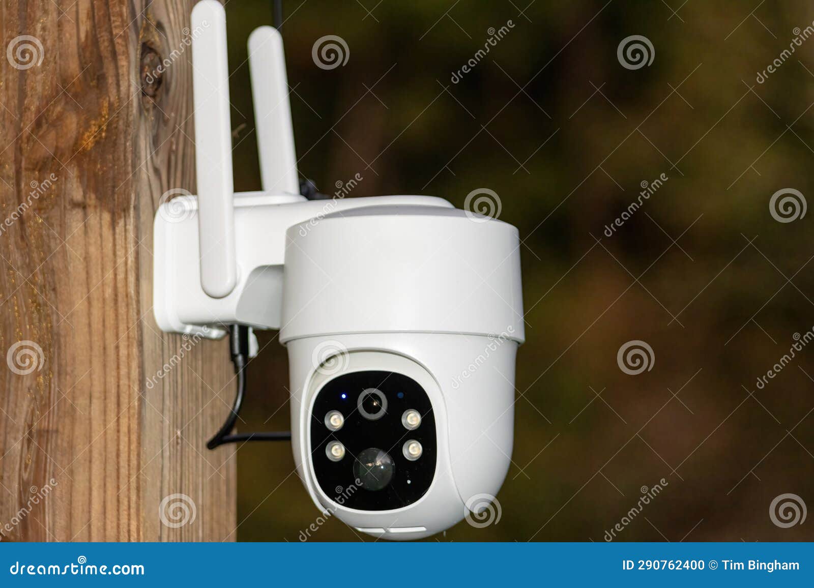 Wireless Security Camera on Post Stock Photo - Image of bottle, wood ...