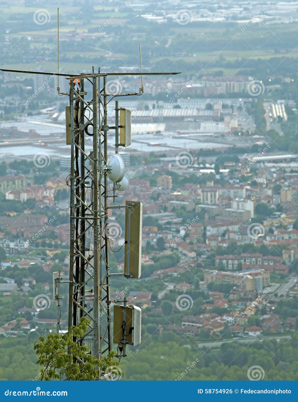 Wireless Telecommunications Antenna Over the Immense Metropolis Stock ...