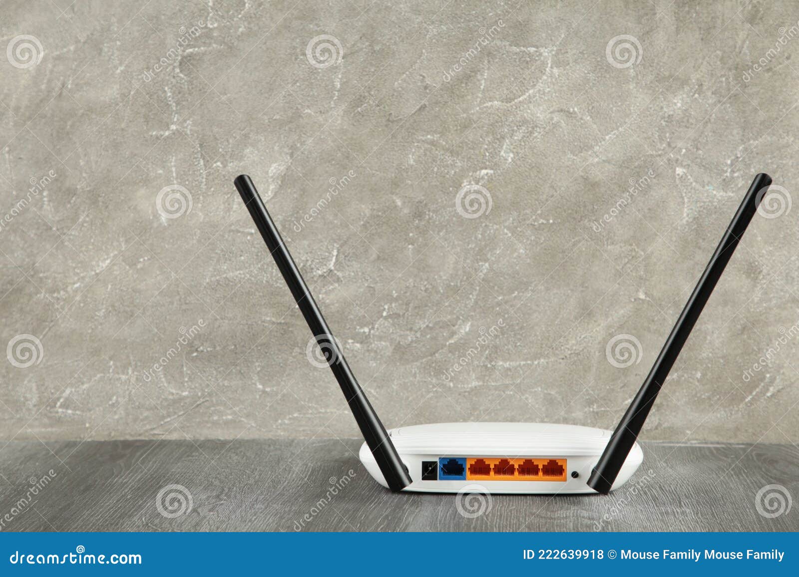 Wireless Wi-Fi Router on Grey Background with Copy Space Stock Photo ...